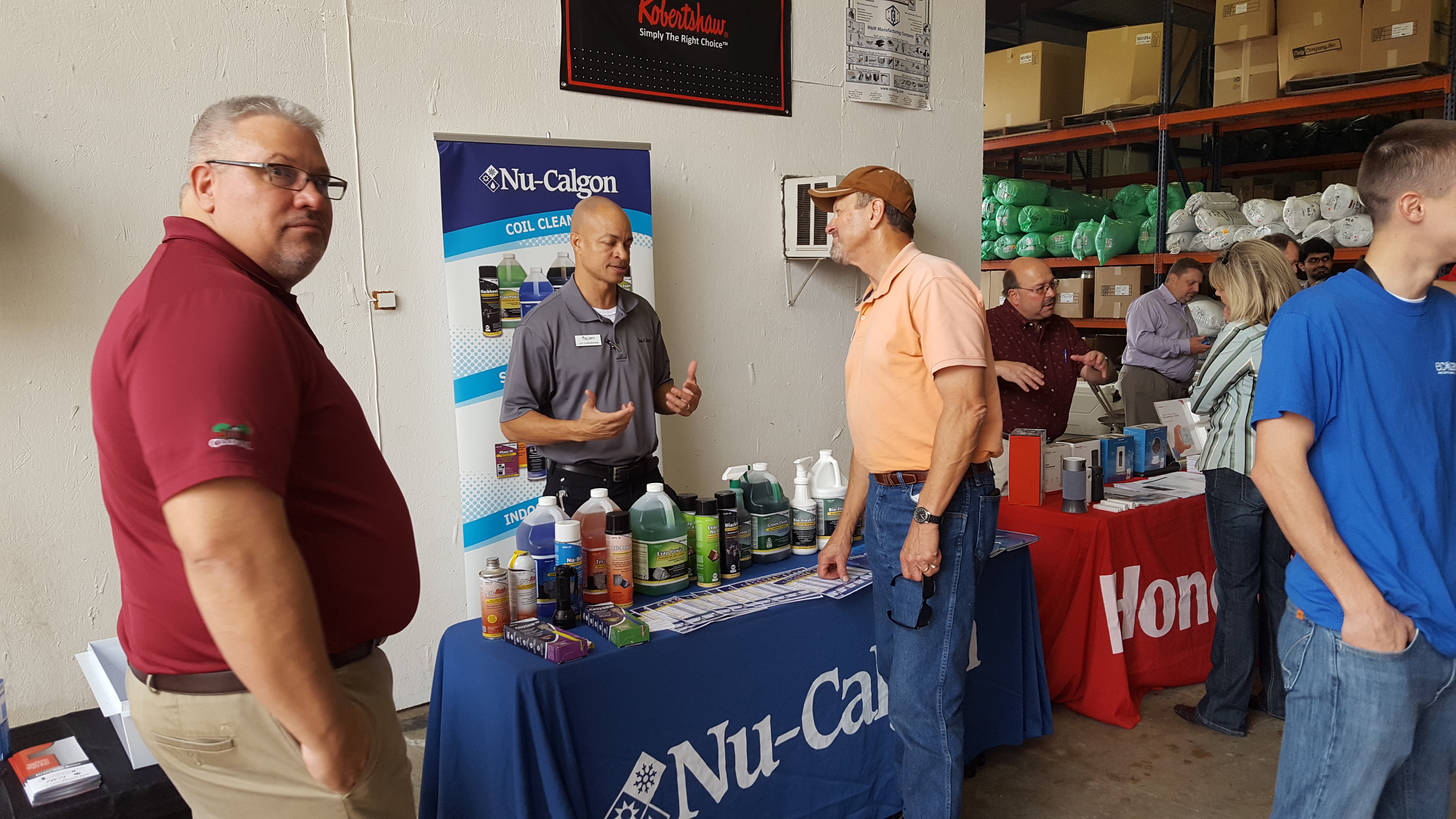 Robert Sqyres looks on as Jay Cunningham talks to a customer | Air ...